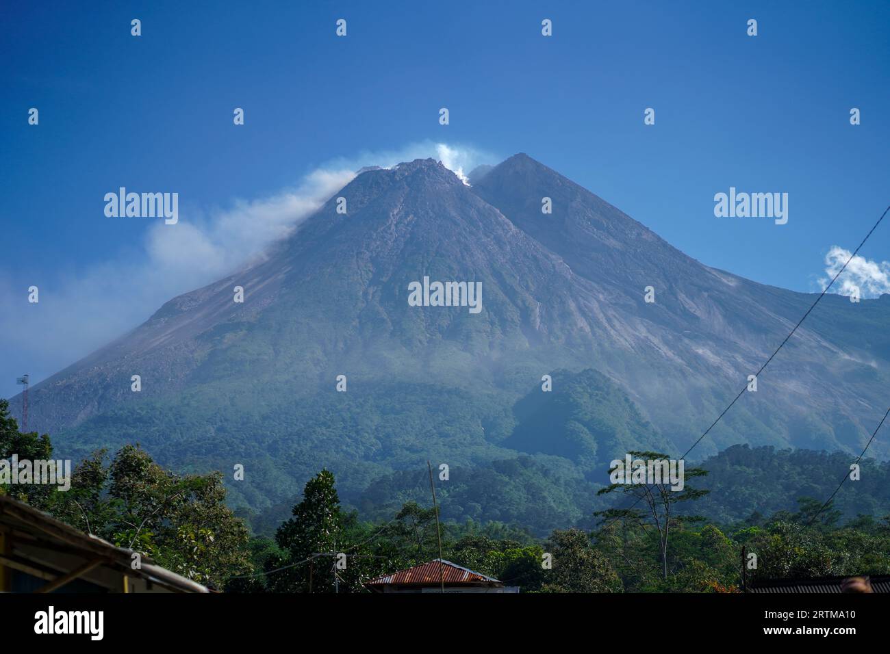 awesome view of Mount Merapi in the morning and emitting smoke, a ...