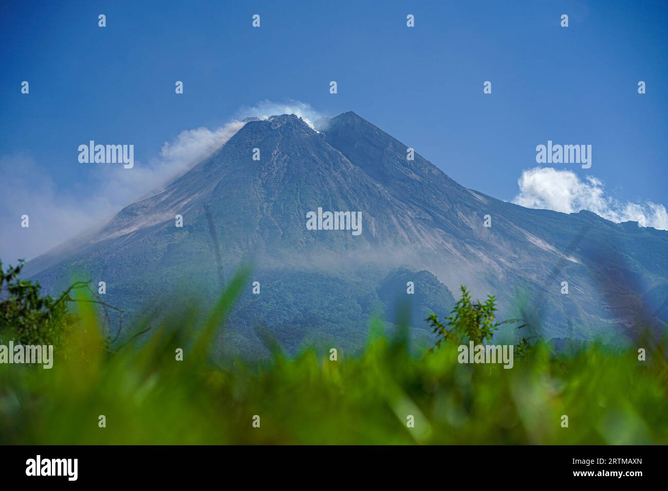 awesome view of Mount Merapi in the morning and emitting smoke, a ...