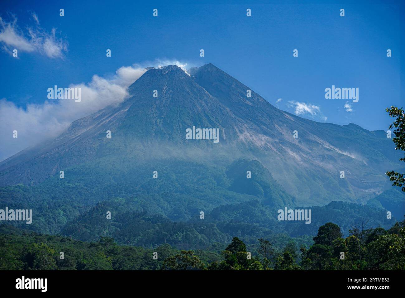 awesome view of Mount Merapi in the morning and emitting smoke, a ...