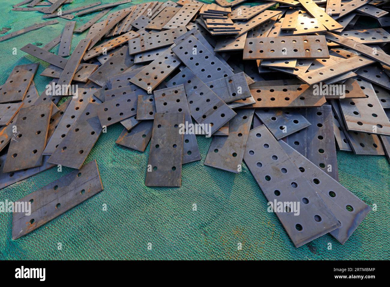 steel plates with holes stacked together Stock Photo - Alamy