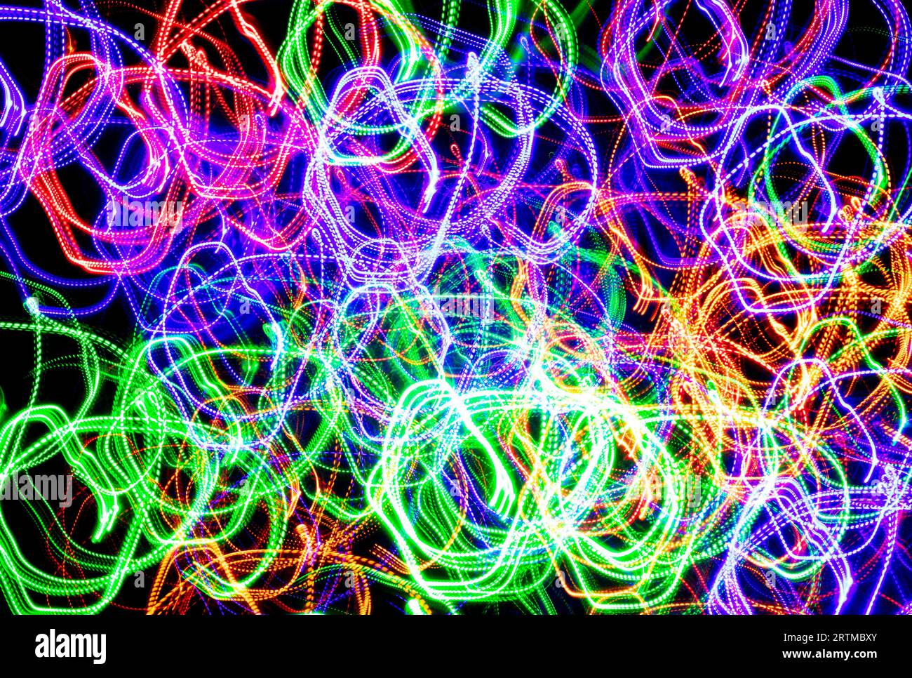 A vibrant array of multi-colored lights shining brightly against a deep ...