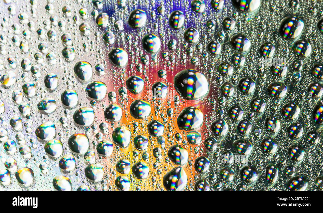 A closeup of a car window with numerous water droplets clinging to the glass Stock Photo - Alamy