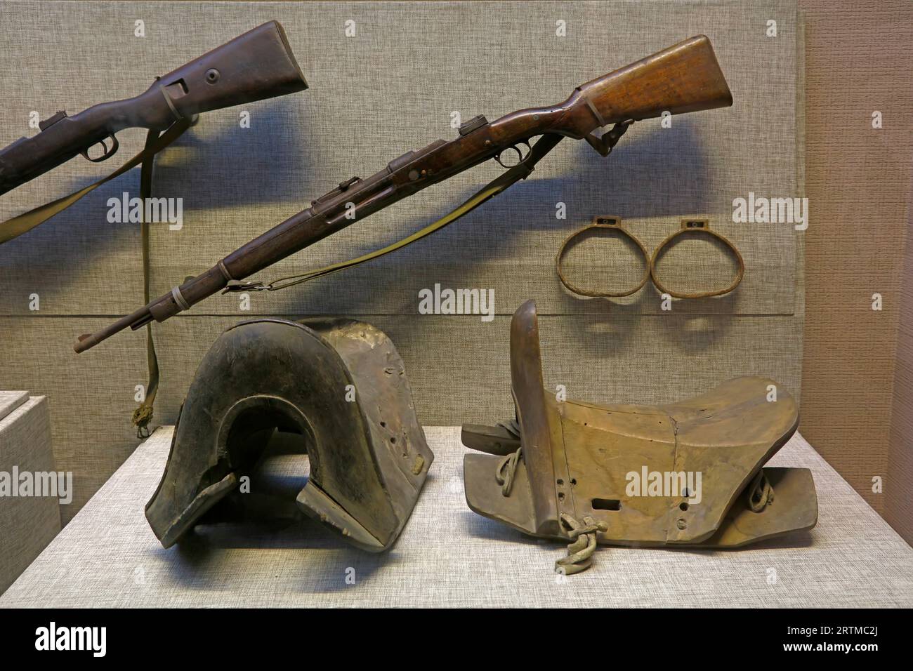 Weapons and equipment in an exhibition hall Stock Photo - Alamy