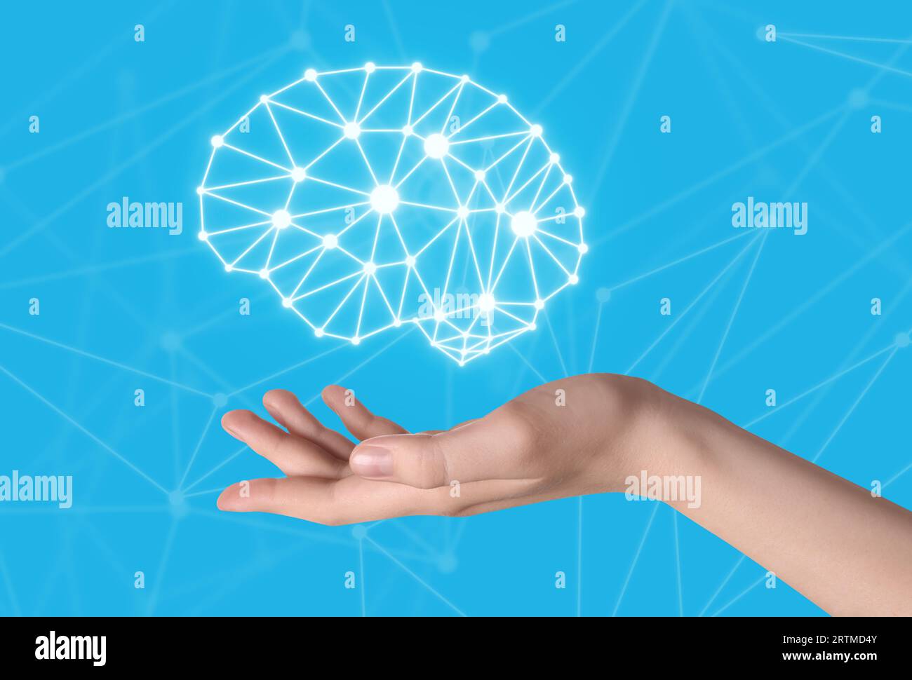 Memory. Woman holding illustration of brain against light blue ...