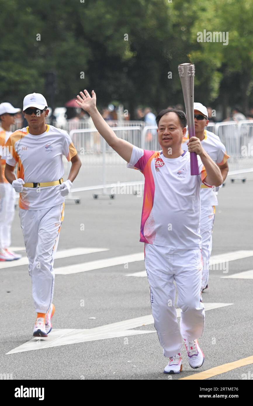 Taizhou, China's Zhejiang Province. 14th Sep, 2023. Torch bearer Zhou ...