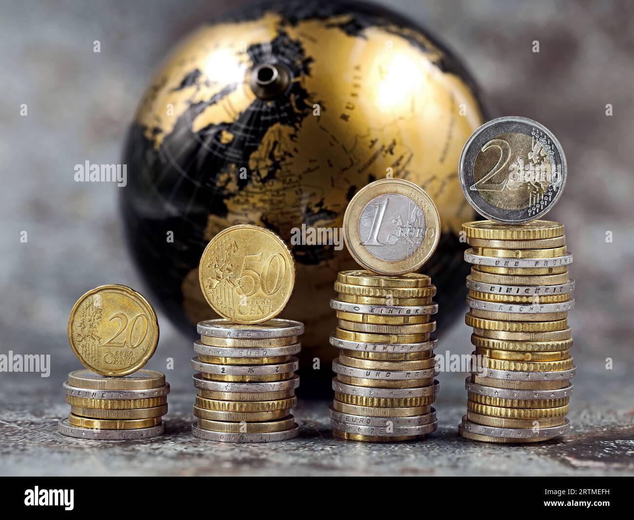 stacks of euro and cent coins symbolize a price increase in front of a ...