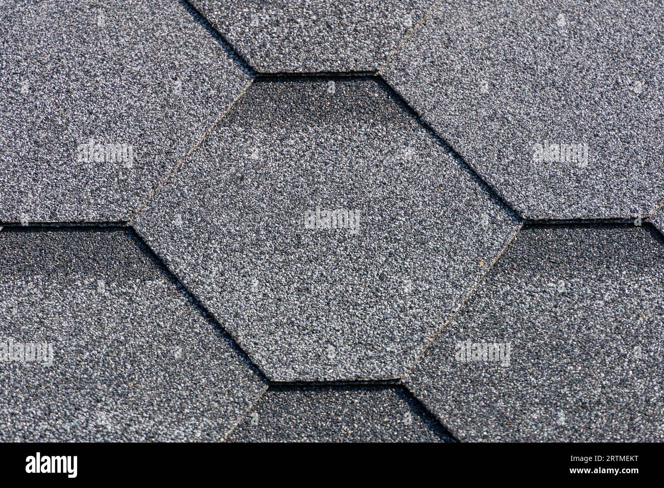 Close up view on asphalt roofing shingles Stock Photo - Alamy