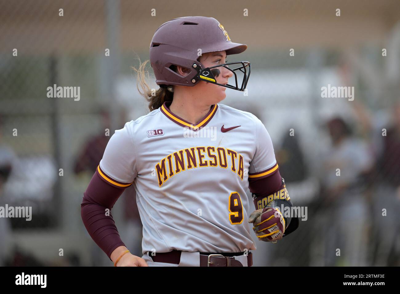 Minnesota's Jess Oakland (9) jogs to first base during an NCAA college ...