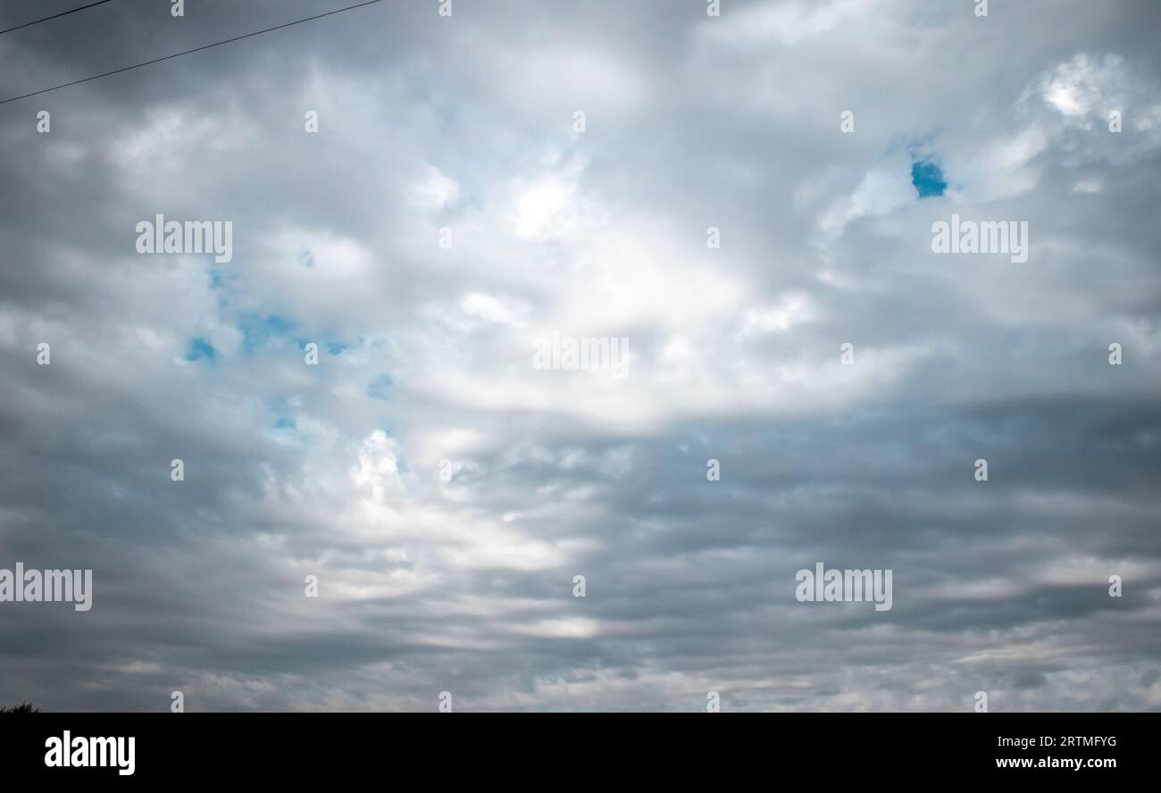 Overcast sky with dark clouds. Dark sky before a thunder-storm. The ...