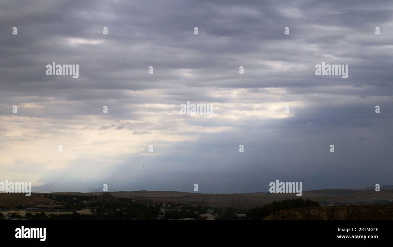 Overcast sky with dark clouds. Dark sky before a thunder-storm. The ...