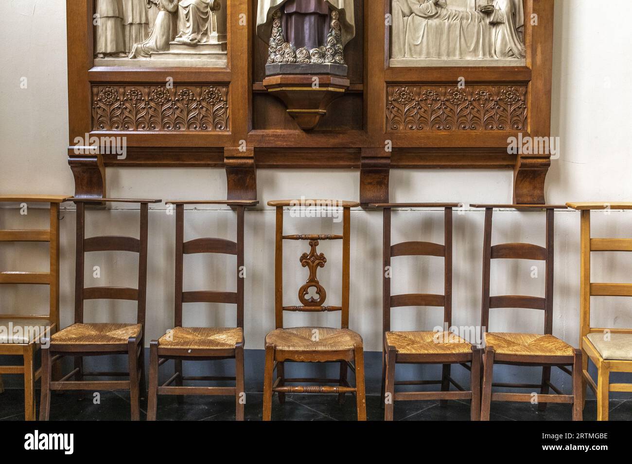 Chairs in Notre Dame Immaculee catholic church, Brussels, Belgium Stock ...