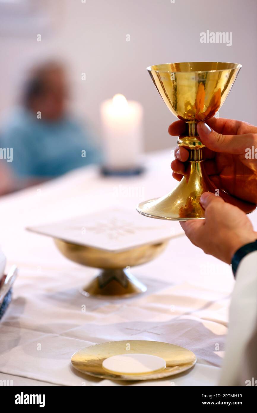 Retirment home. Sunday catholic mass in the chapel. Eucharist ...
