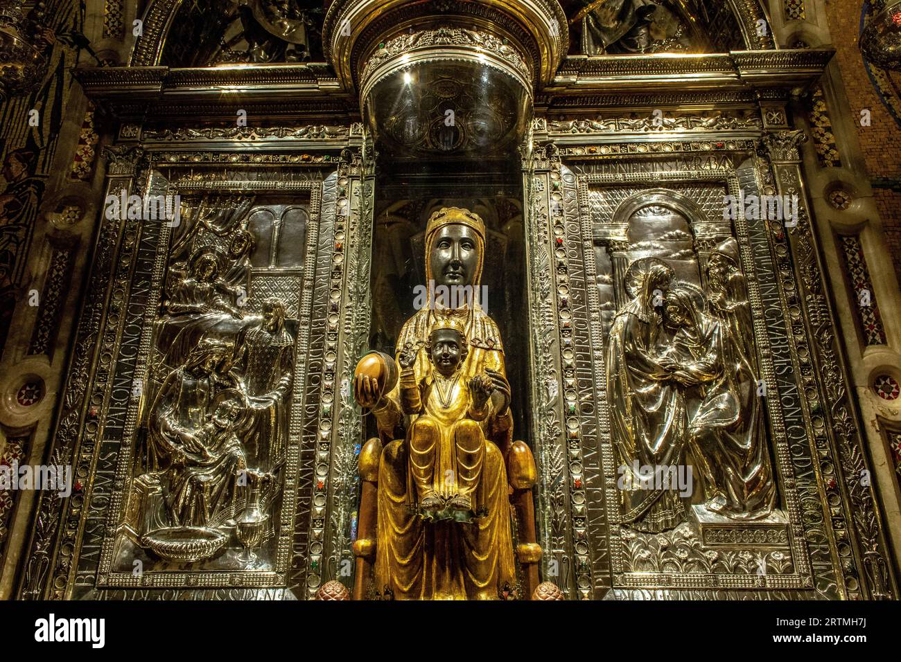 Montserrat monastery, Catalonia, Spain. Our Lady black madonna statue in the church sanctuary ...