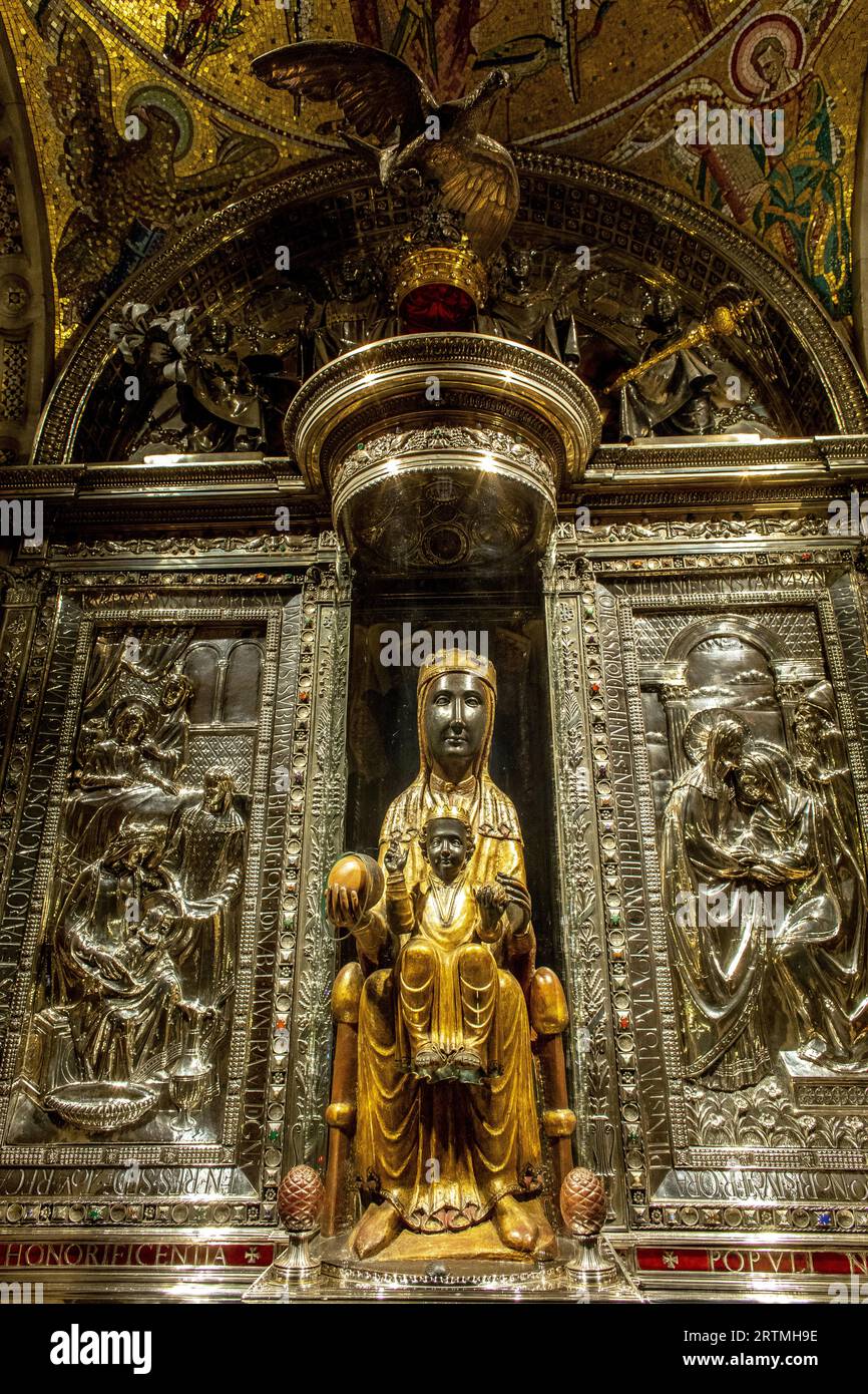 Montserrat monastery, Catalonia, Spain. Our Lady black madonna statue in the church sanctuary ...