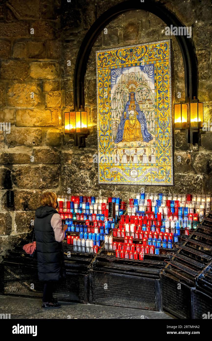 Montserrat monastery, Catalonia, Spain. Faithful praying in the Virgin ...