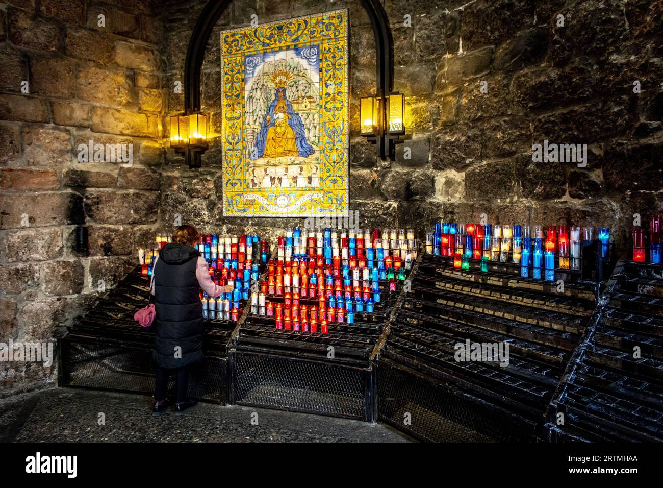 Montserrat monastery, Catalonia, Spain. Faithful praying in the Virgin ...