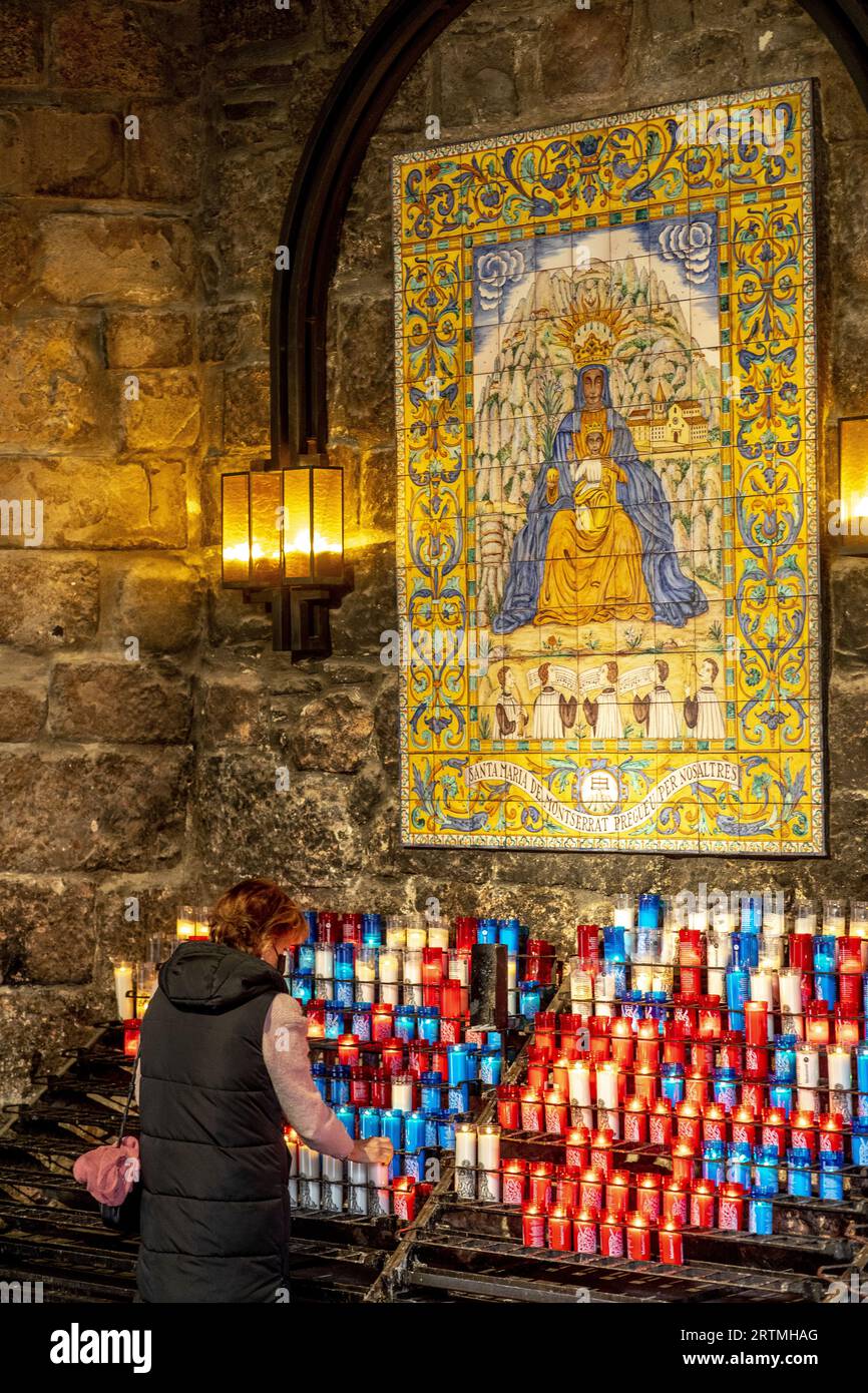 Montserrat monastery, Catalonia, Spain. Faithful praying in the Virgin ...