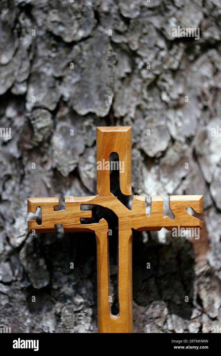 Wooden cross with the name of Jesus Stock Photo - Alamy