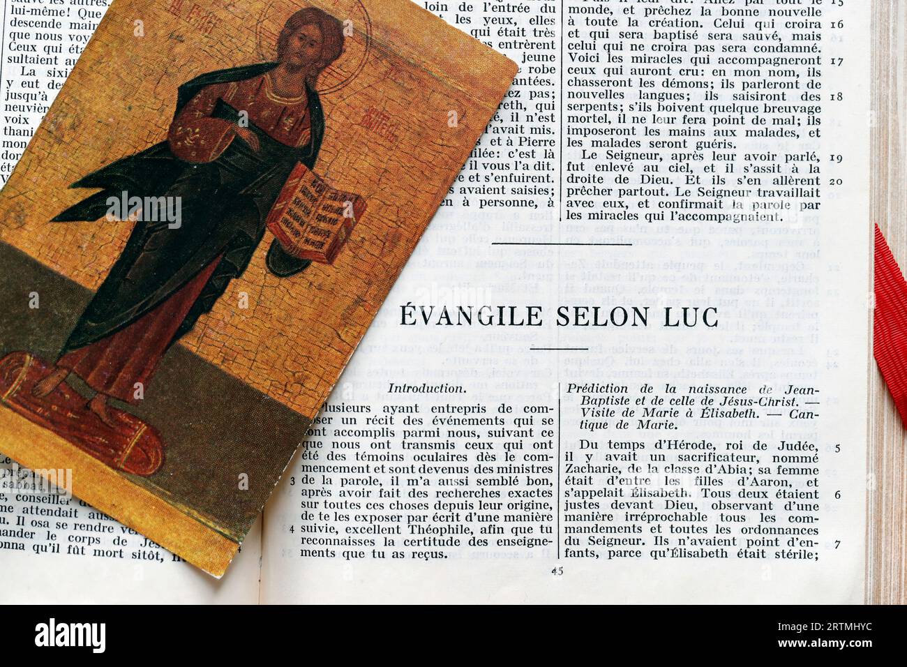Open bible in french with religious image. Gospel of Luke. Jesus Stock ...