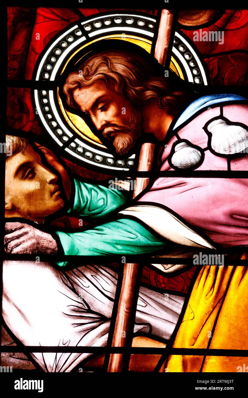 Catholic church. Stained glass window. Healing the paralytic at ...