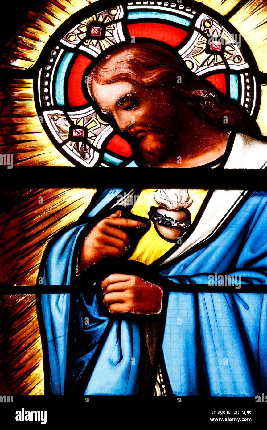 Catholic church. Stained glass window. Jesus Christ. His wounded hand ...