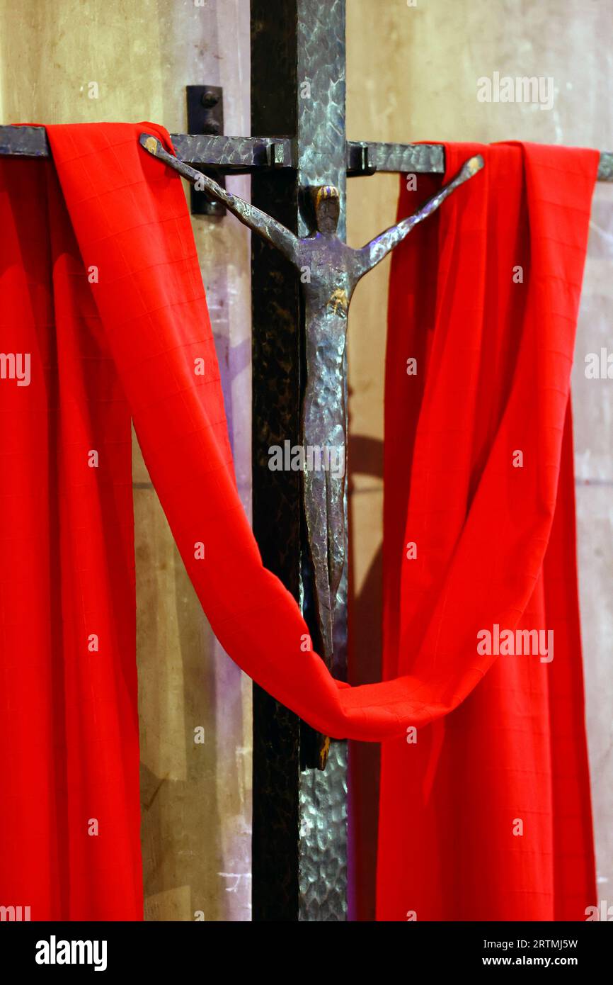 Saint Francois de Sales Basilica. Wooden cross with red cloth wrapped ...