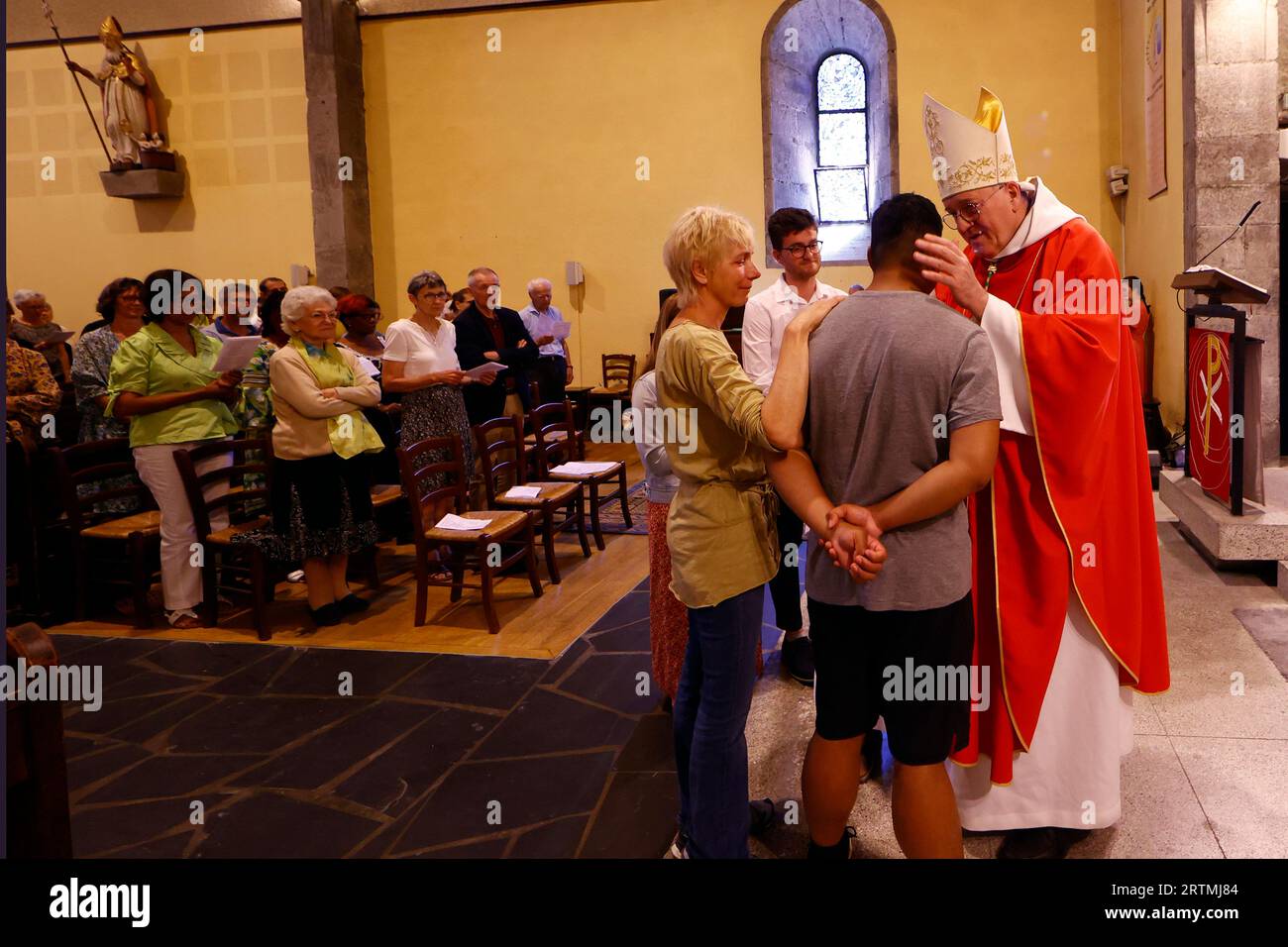 Saint Nicolas church. Catholic mass. Adult confirmation ceremony ...