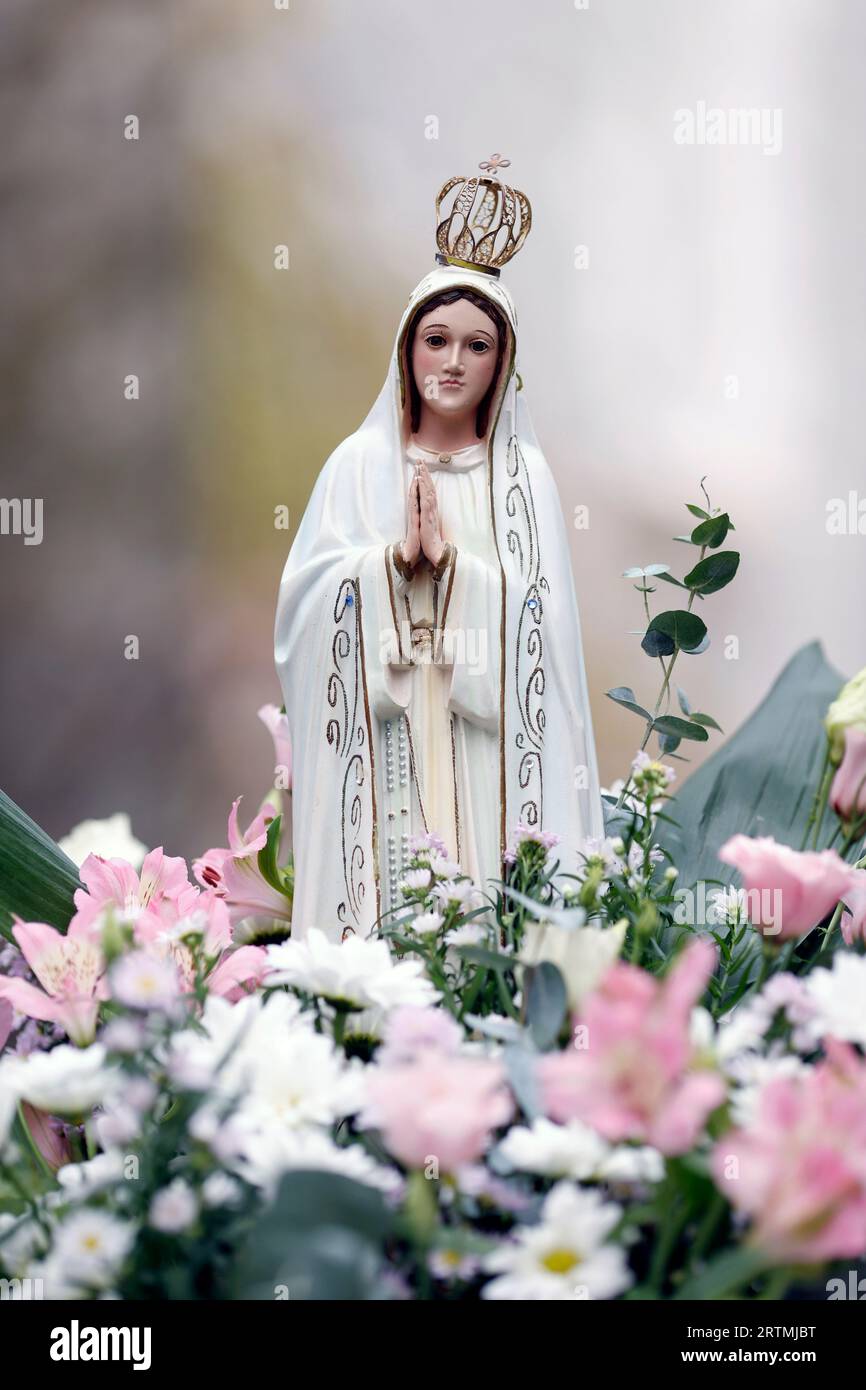 Saint Maurice church. Catholic mass. The statue of Our Lady of Fatima ...