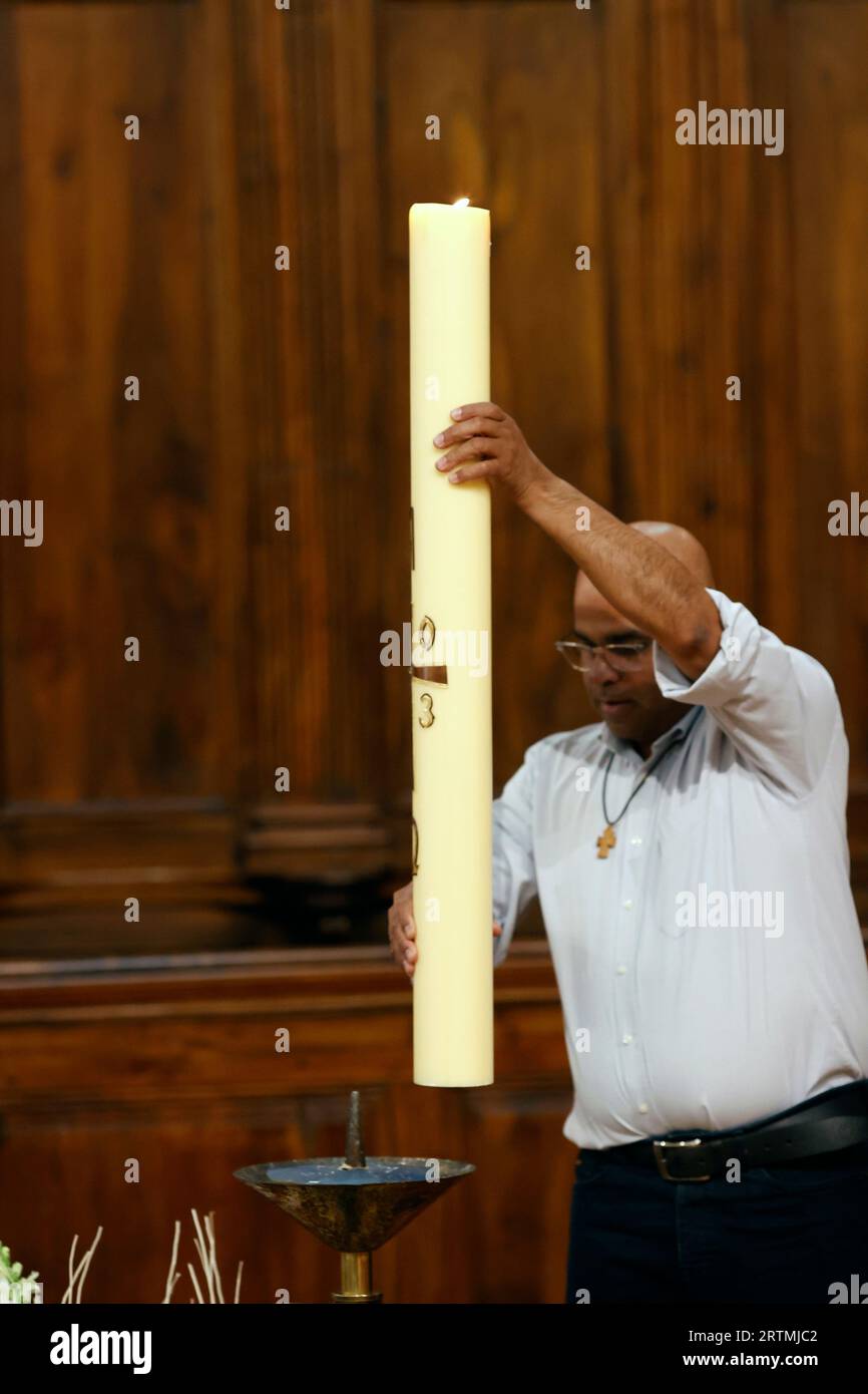 Paschal candle mass hi-res stock photography and images - Alamy