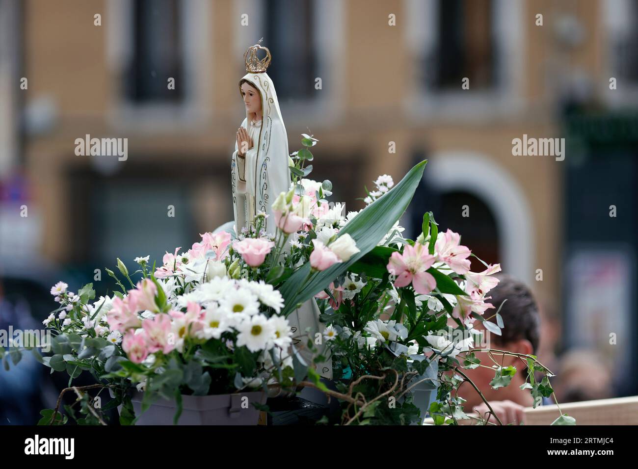 Saint Maurice church. Catholic mass. The statue of Our Lady of Fatima ...