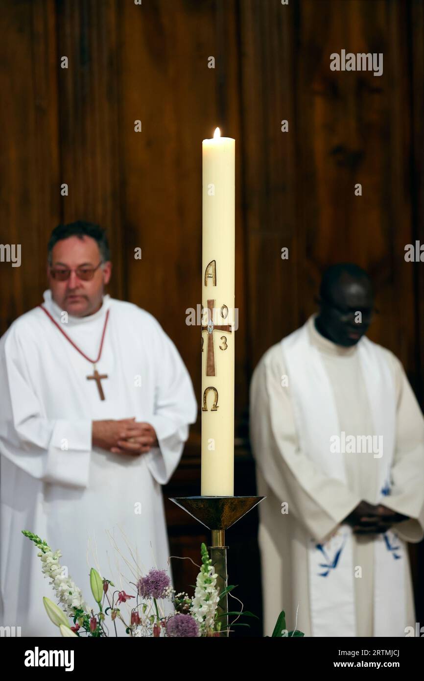 Paschal candle mass hi-res stock photography and images - Alamy