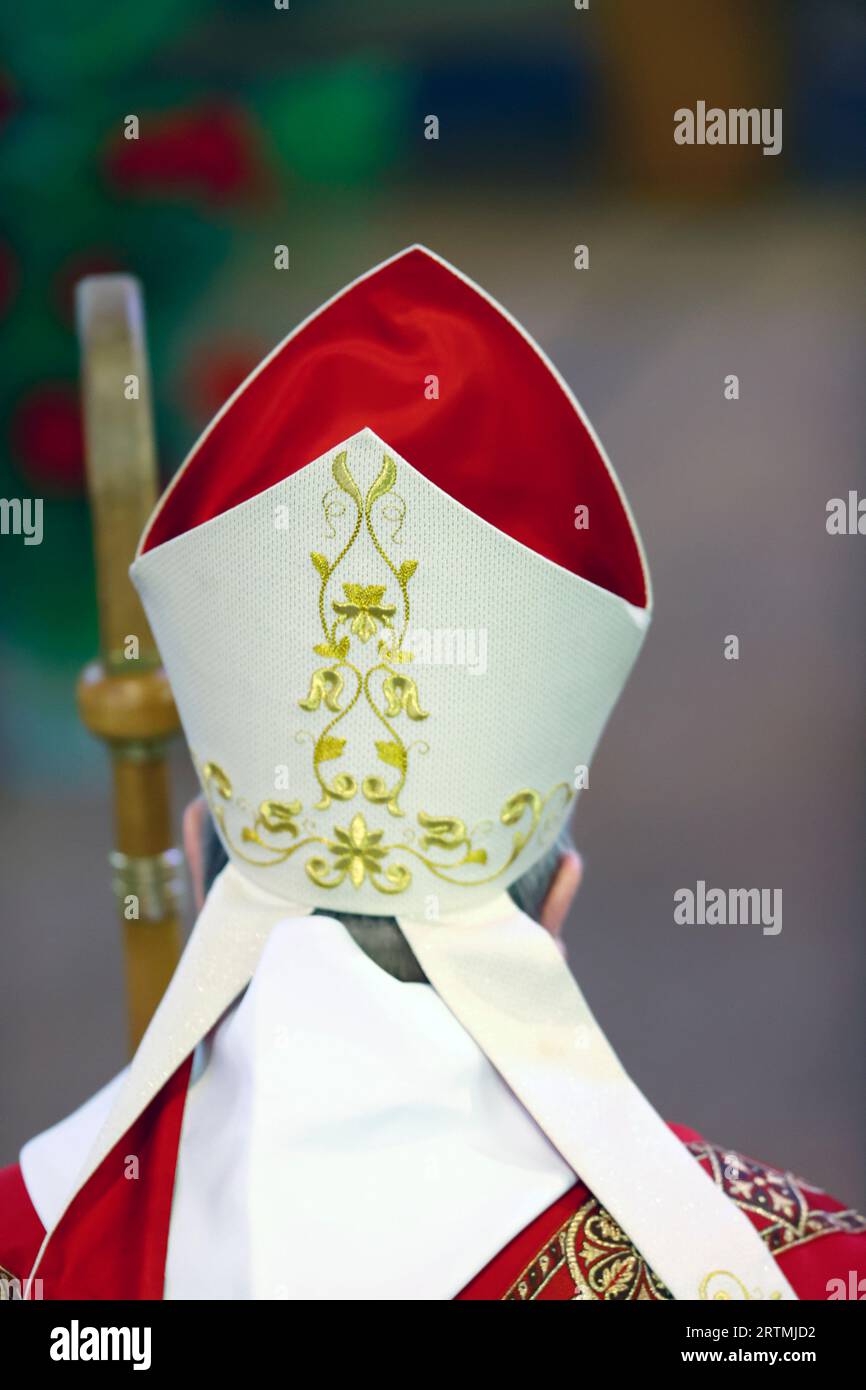 St Francis de Sales basilica. Catholic mass. Bishop wearing white miter ...
