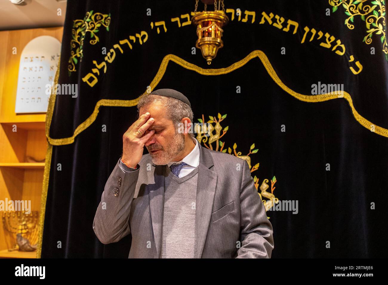 Purim celebration in Beth Yaacov synagogue, Paris, France. Rabbi ...