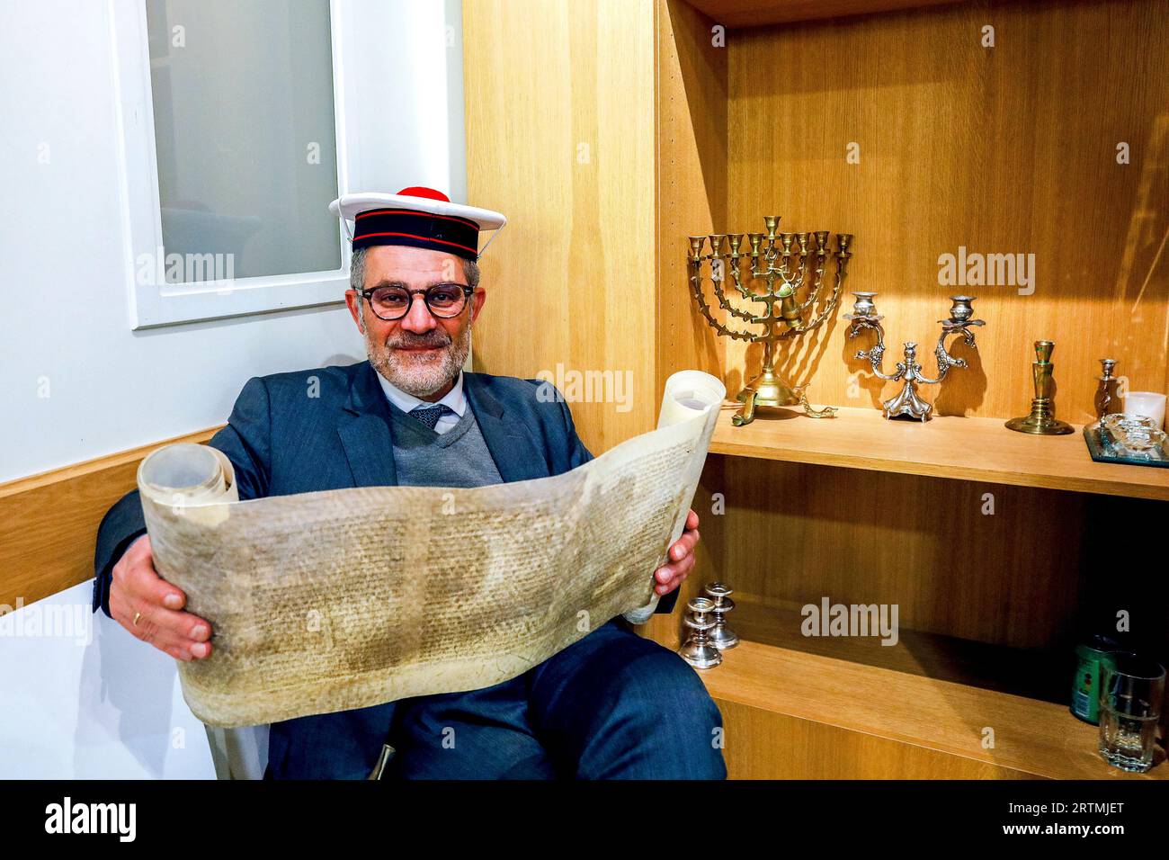 Sitting celebration holding religion hi-res stock photography and ...