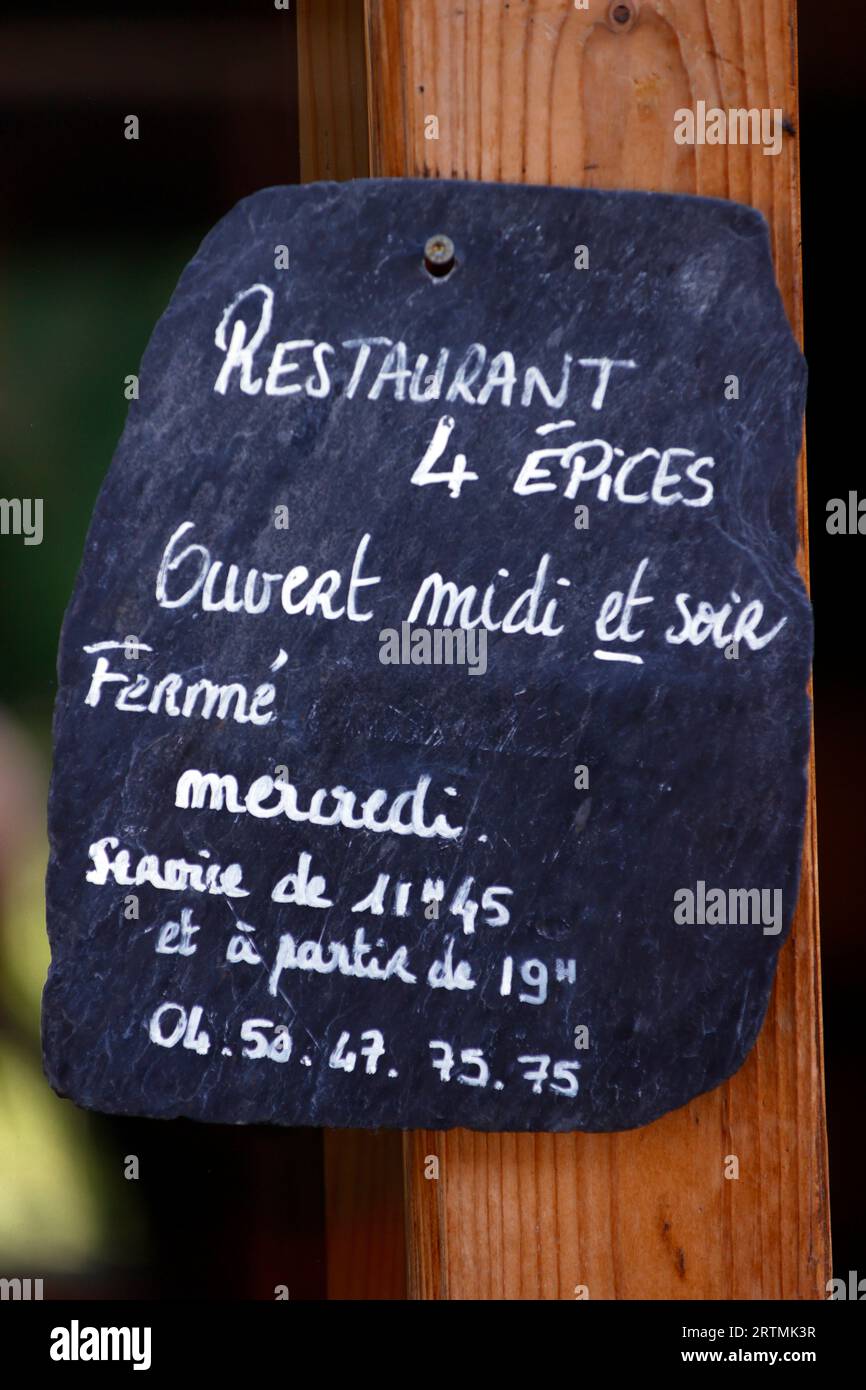 Restaurant business opening hours sign. Saint-Gervais Mont-Blanc ...