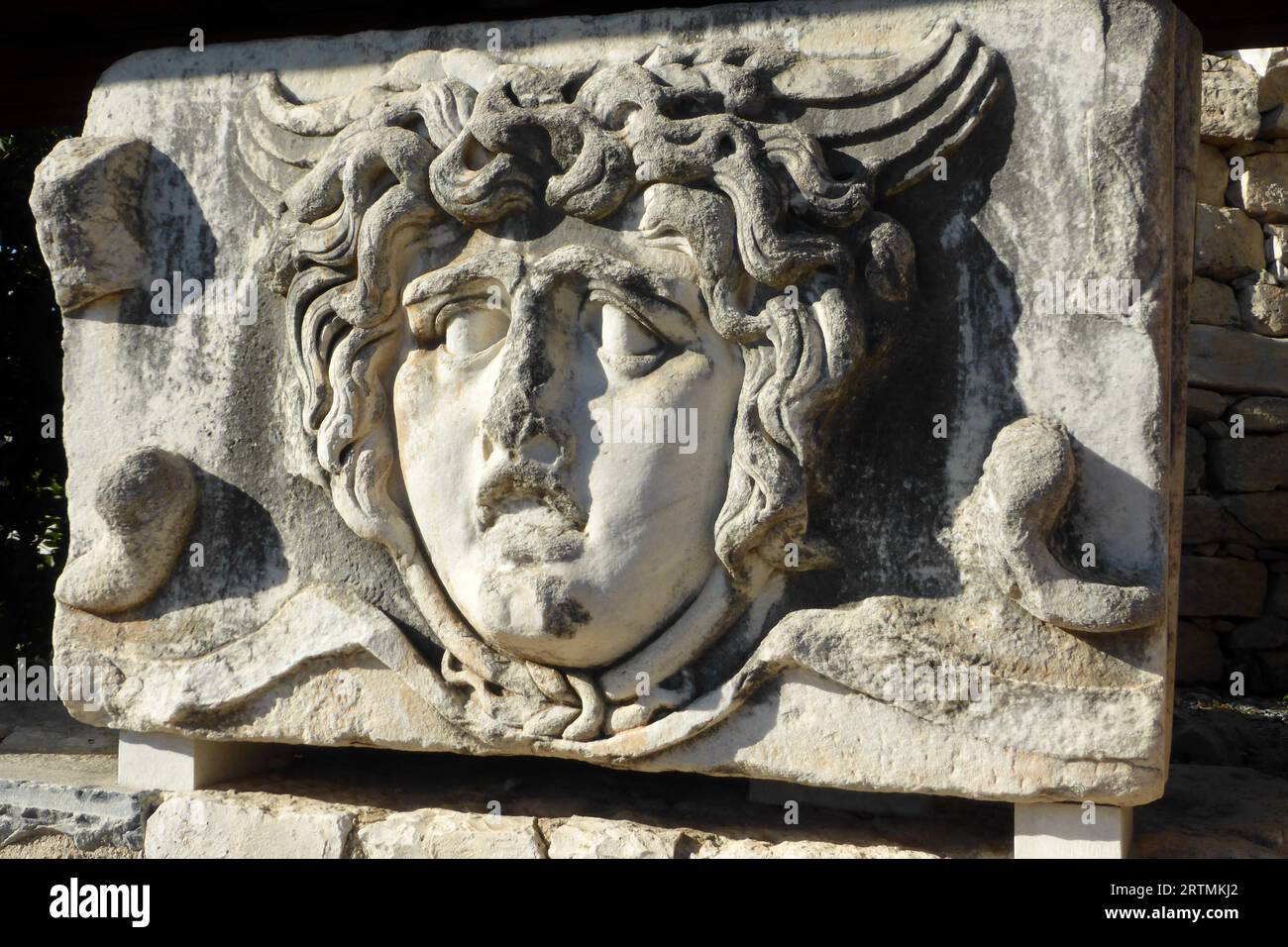 Ancient Greek Carving at The ruins of the Temple of Apollo at Ancient ...