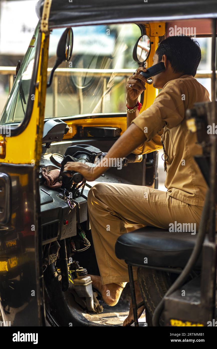 Autorickshaw driver in Mumbai, India Stock Photo - Alamy