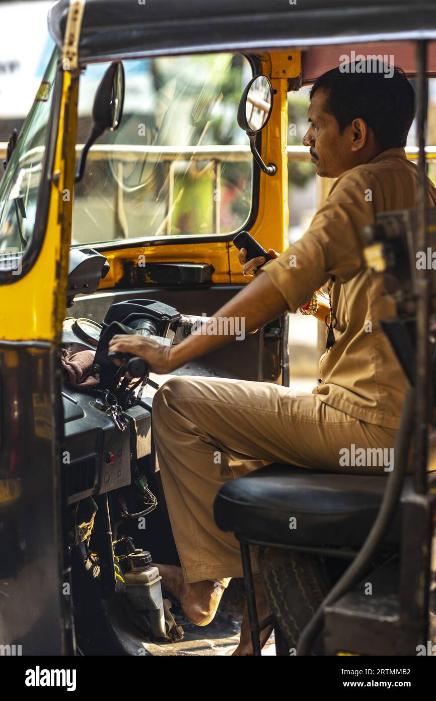 Autorickshaw driver in Mumbai, India Stock Photo - Alamy