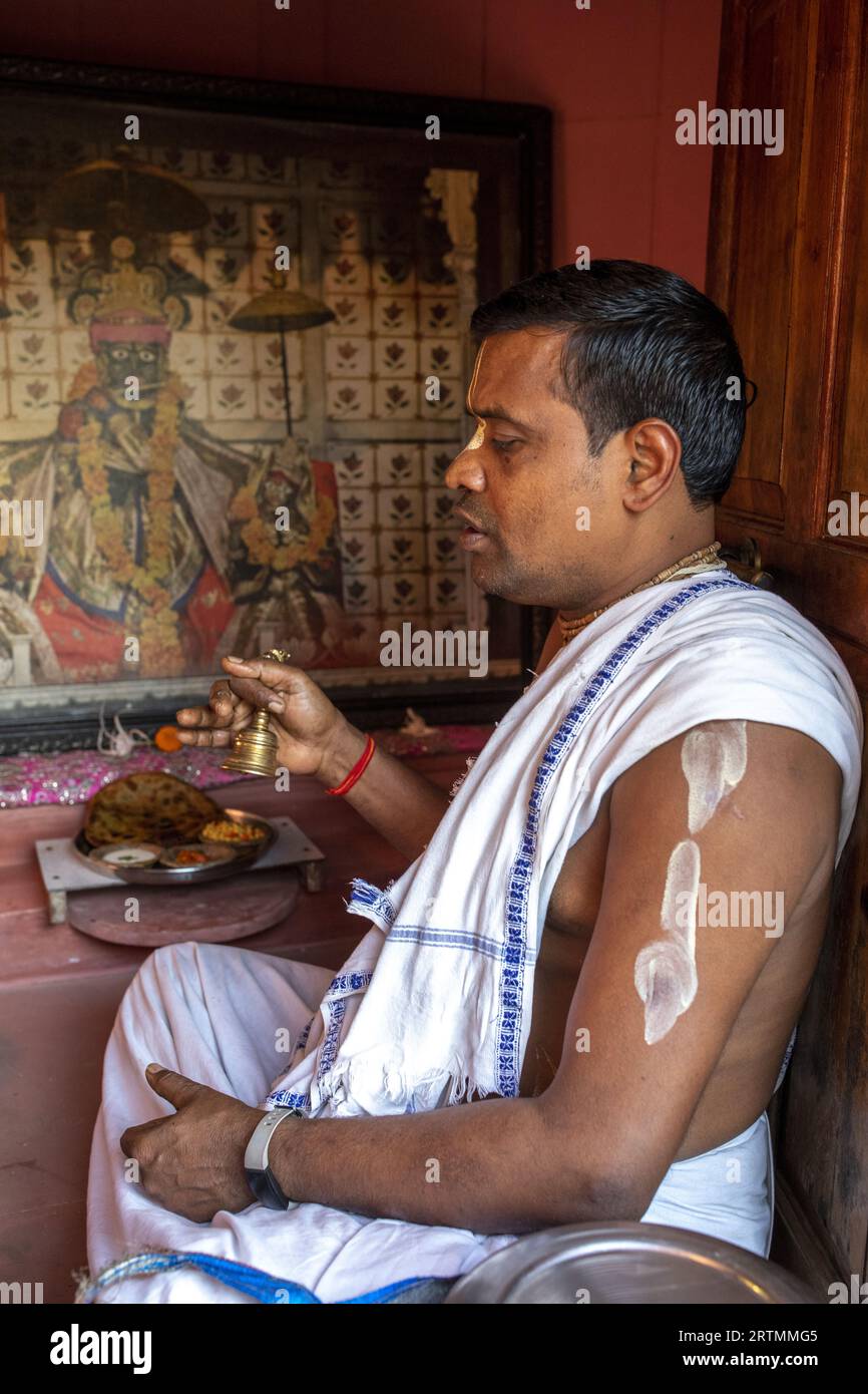 Priest performing ritual in a temple at Goverdan ecovillage, Maharashtra, India Stock Photo - Alamy