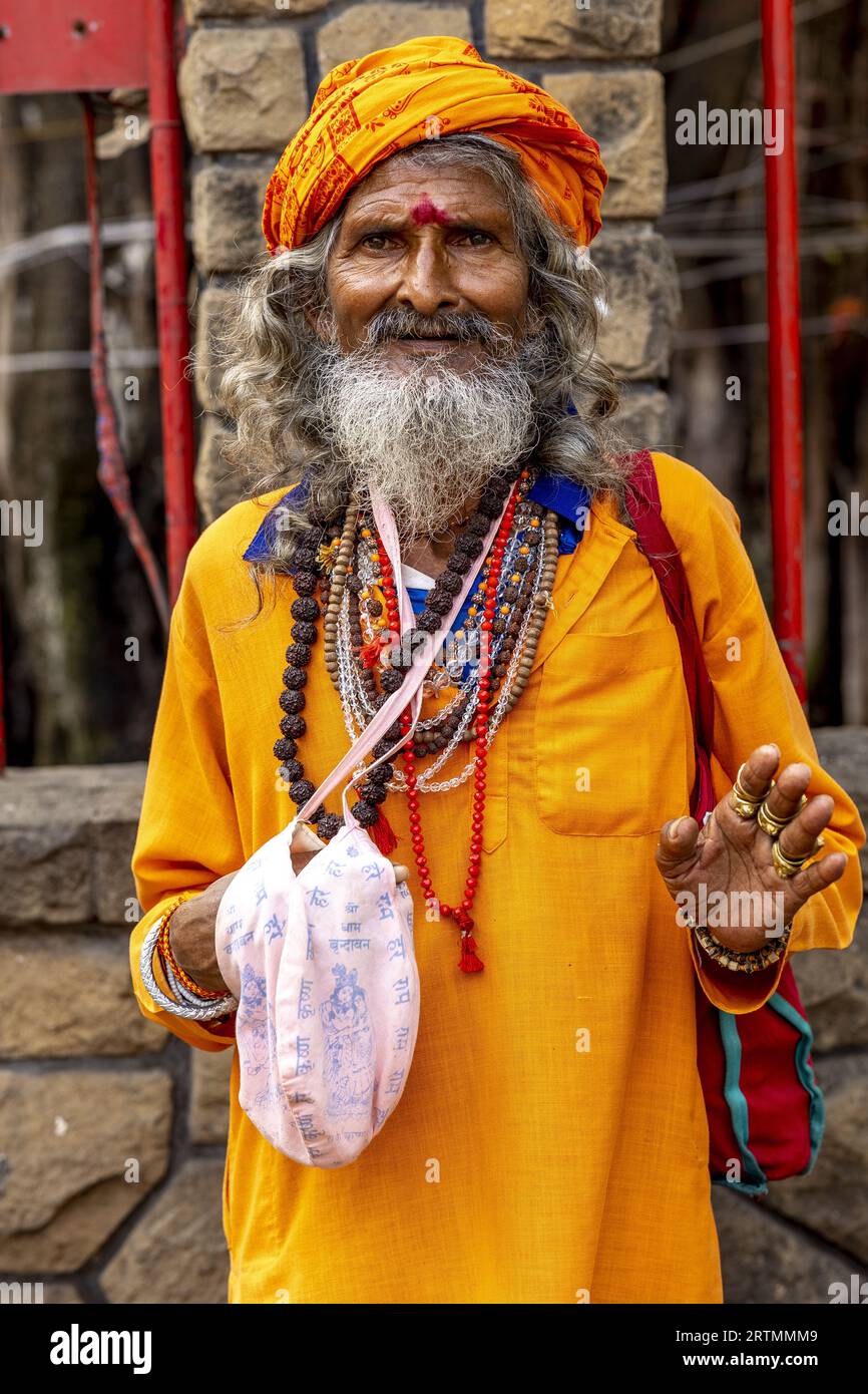 Sadhu with prayer bead bag in Juhu, Mumbai, India Stock Photo - Alamy