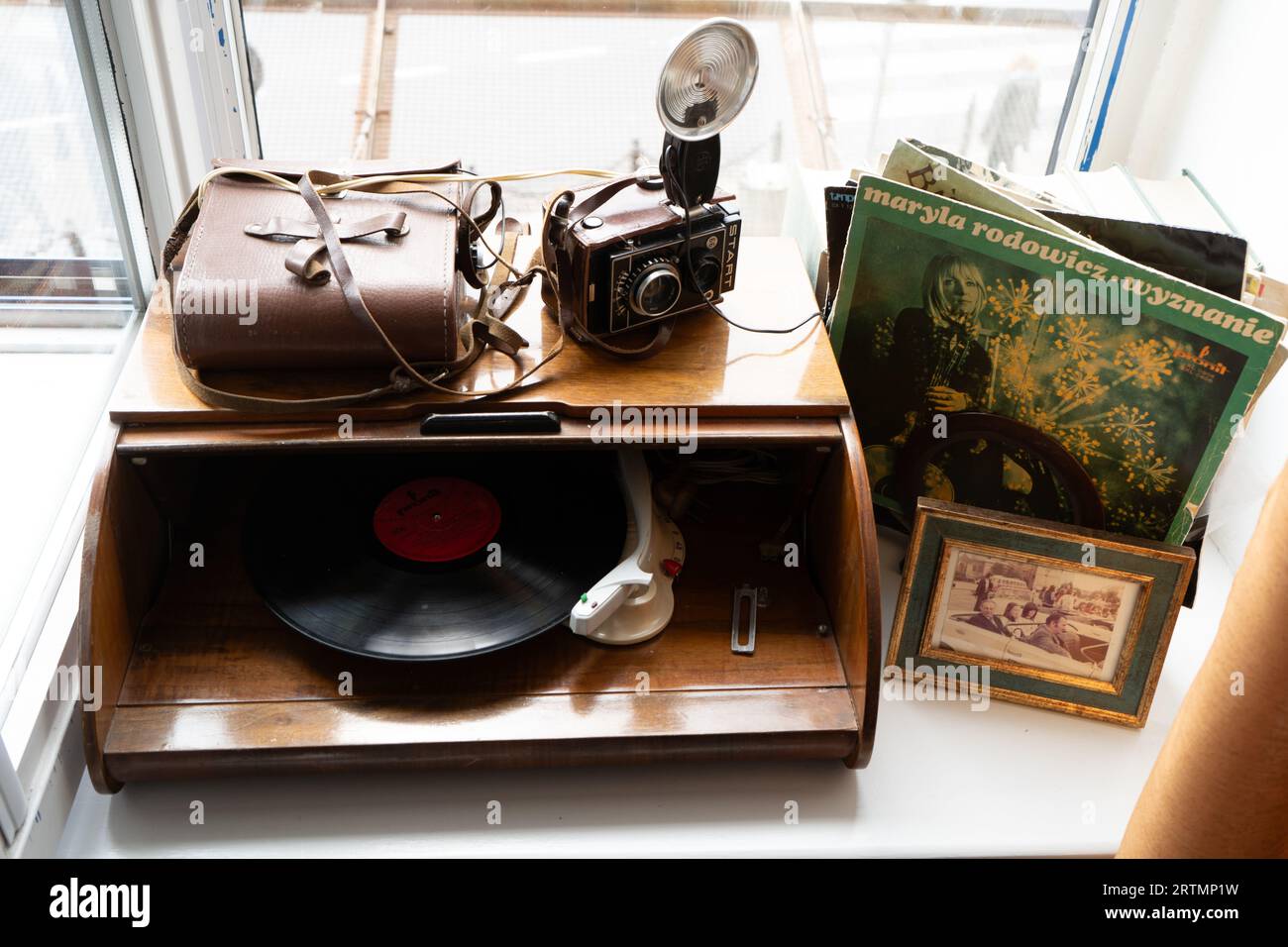 Old photo camera START 66 with flash and lens. Record player ...