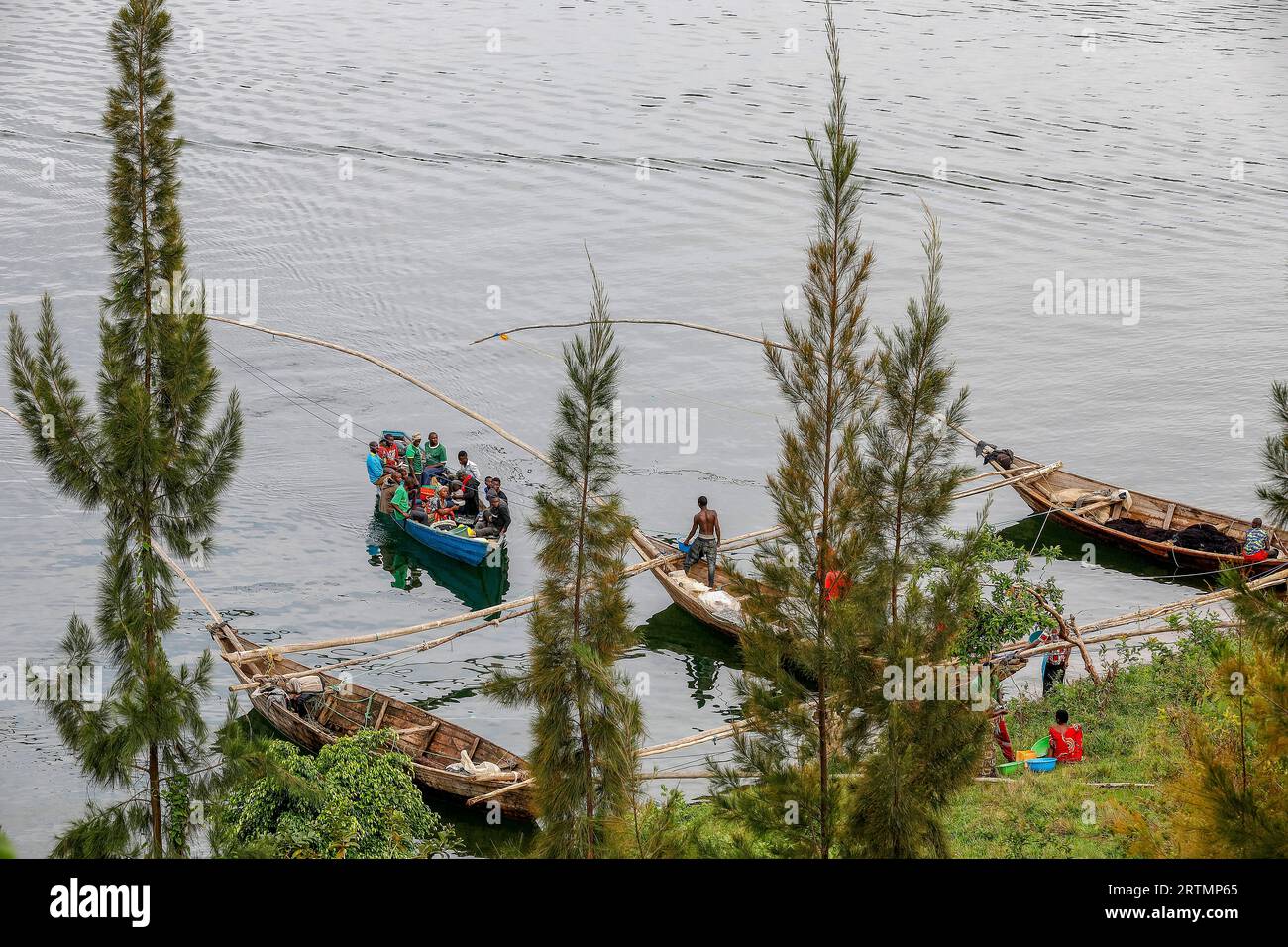 Fishing boats returning to shore on Kivu lake, Karongi, Rwanda Stock ...