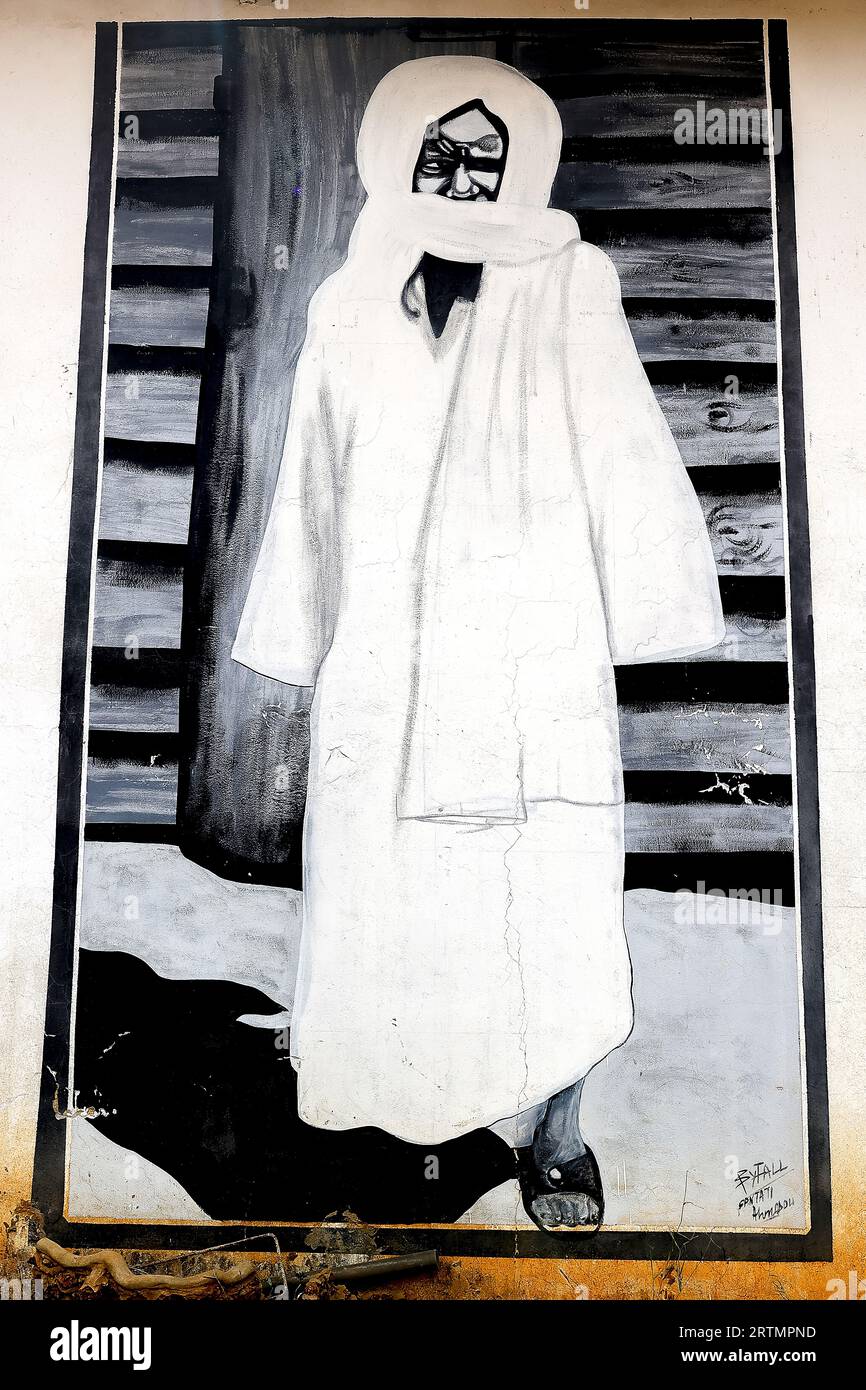 Wall with pictures of mouride muslim spiritual leader Ahmadou Bamba in ...