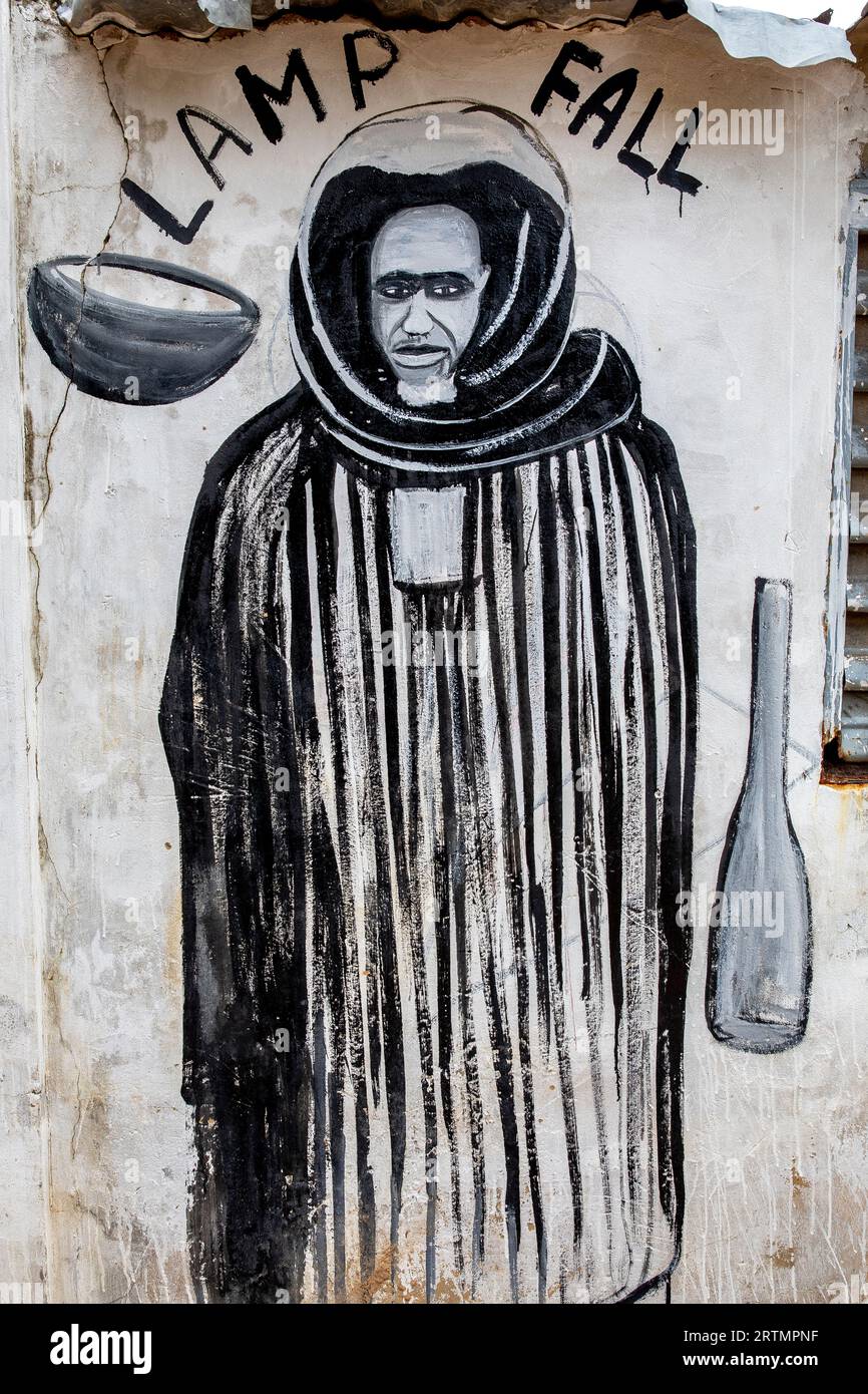 Wall with pictures of mouride muslim spiritual leaders in Tawafall ...