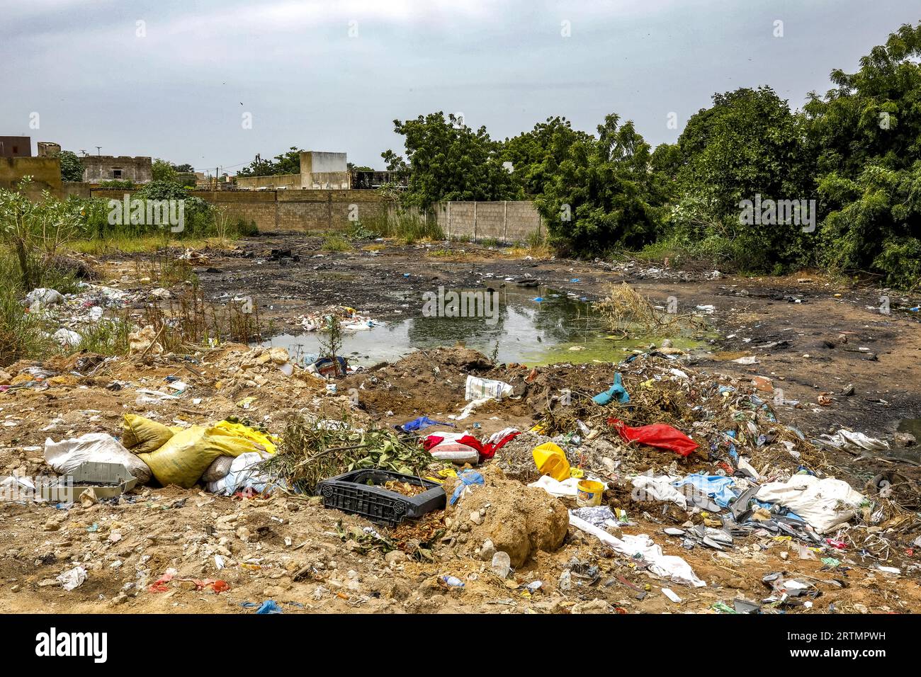 Garbage thrown in a public place in Thies, Senegal Stock Photo - Alamy