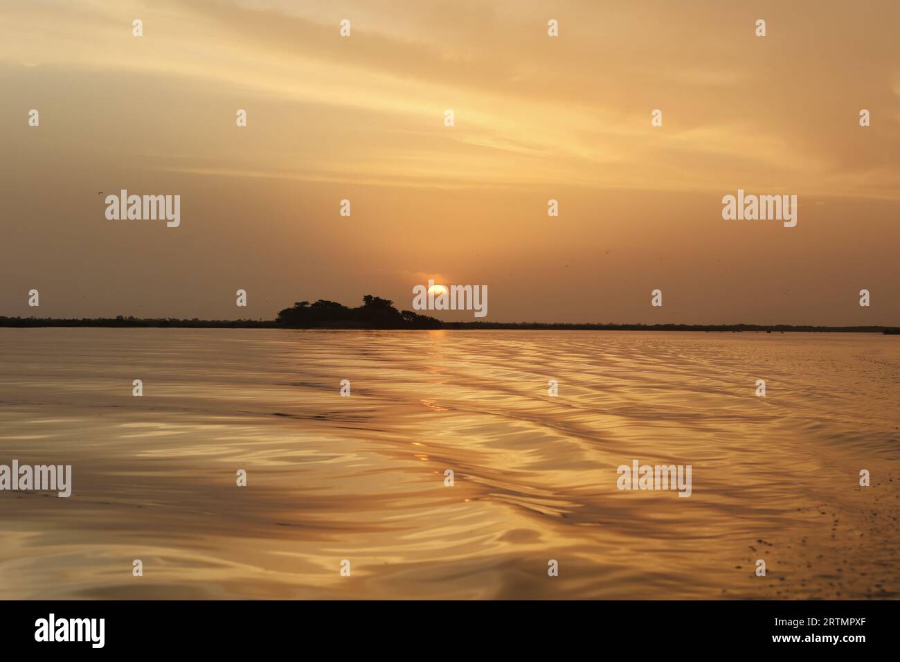 Sunset over the Saloum river delta in Senegal Stock Photo - Alamy