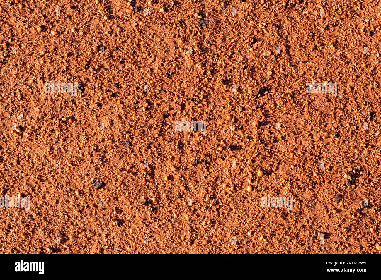 Background of red granular sand with high iron content Stock Photo - Alamy