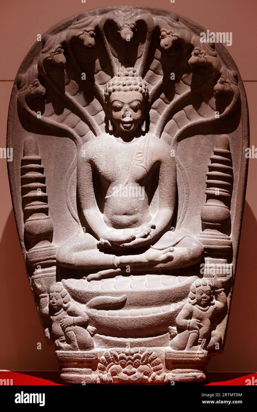 Bangkok National Museum. Buddha in meditation under seven headed Naga ...