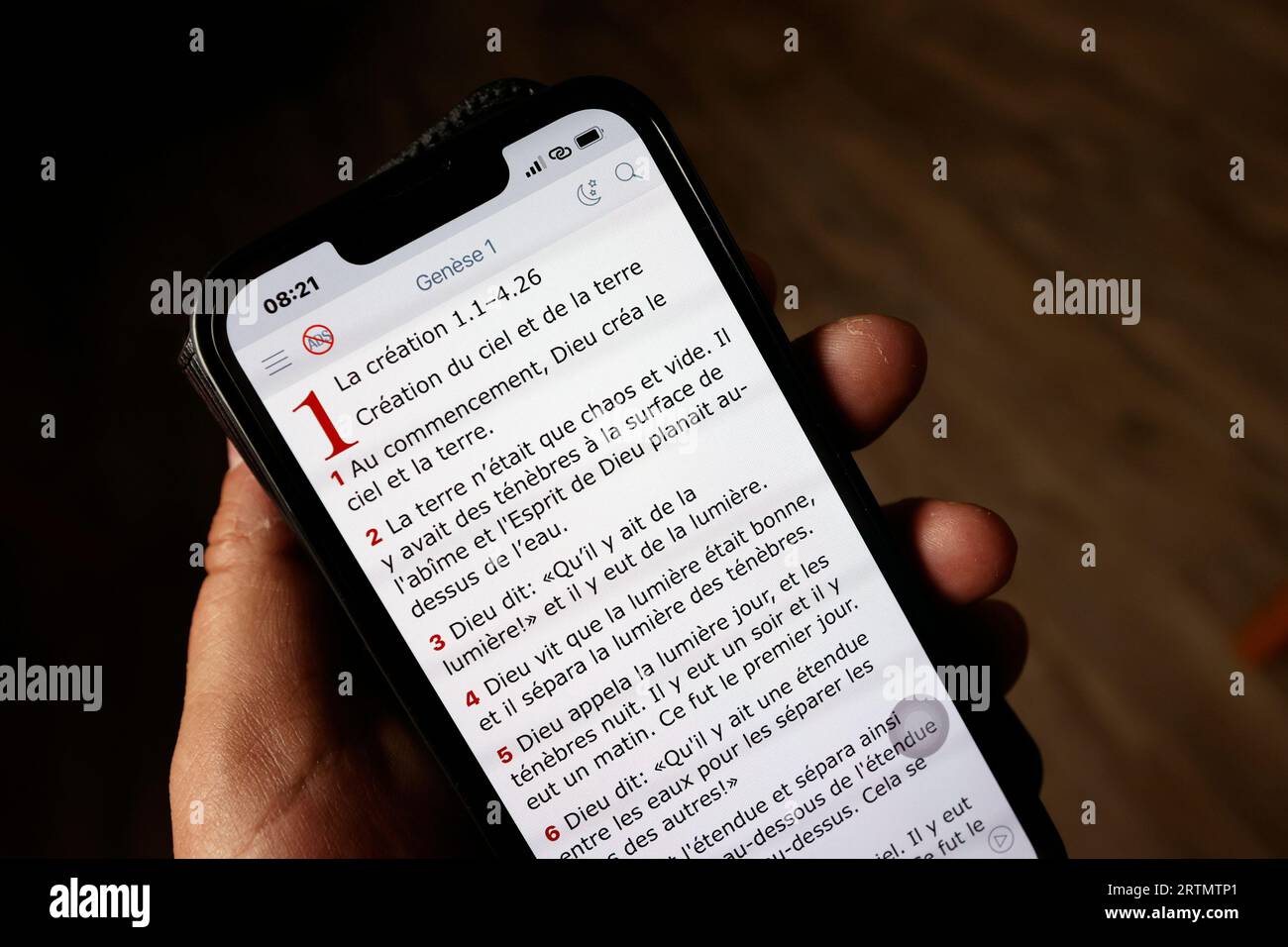 Digital bible app on a smartphone. Man reading the Old Testament Stock ...