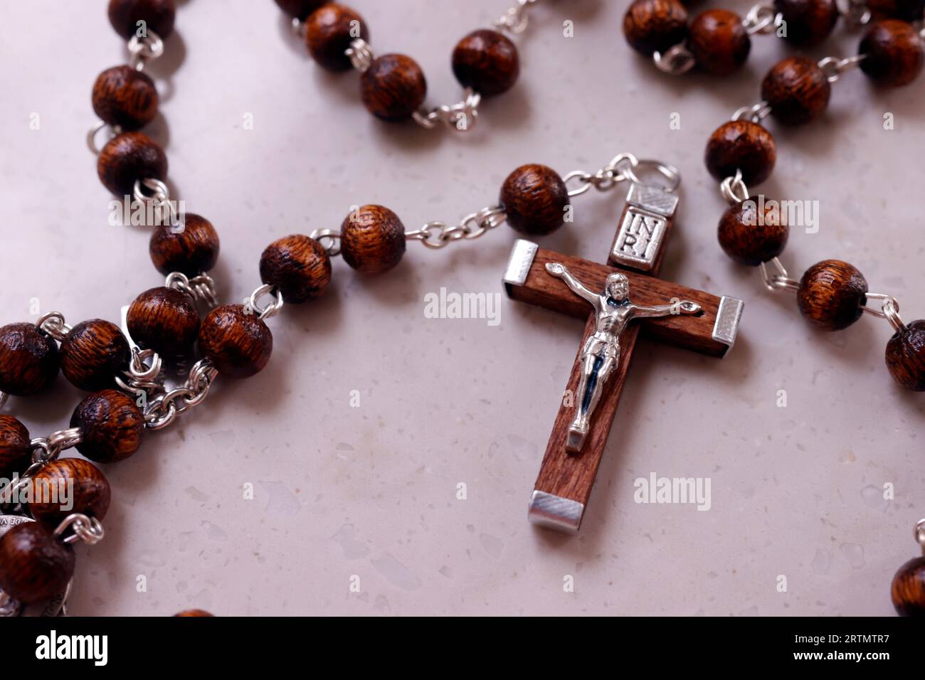 Catholic wooden rosary beads. Crucifix Stock Photo - Alamy